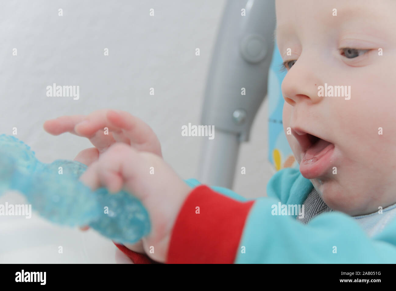 Photo of the Cute little baby boy is playing with toys Stock Photo - Alamy