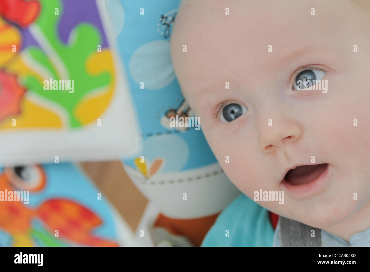 Photo of the Cute little baby boy is playing with toys Stock Photo - Alamy