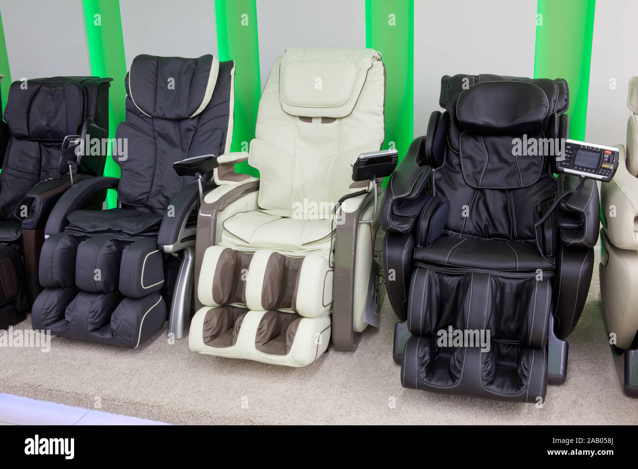 Massage leather chairs in the bright Spa. relaxation and recreation ...