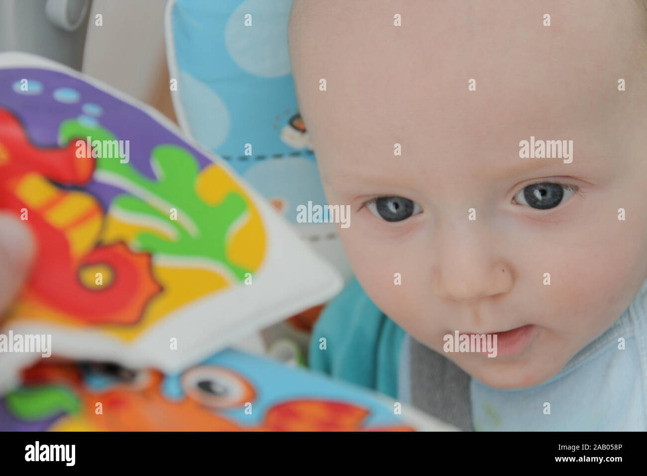 Photo of the Cute little baby boy is playing with toys Stock Photo - Alamy