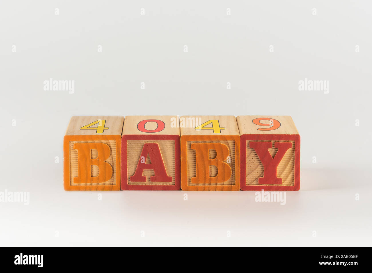 A child's alphabet toy spelling word block set, spelling out the word ...