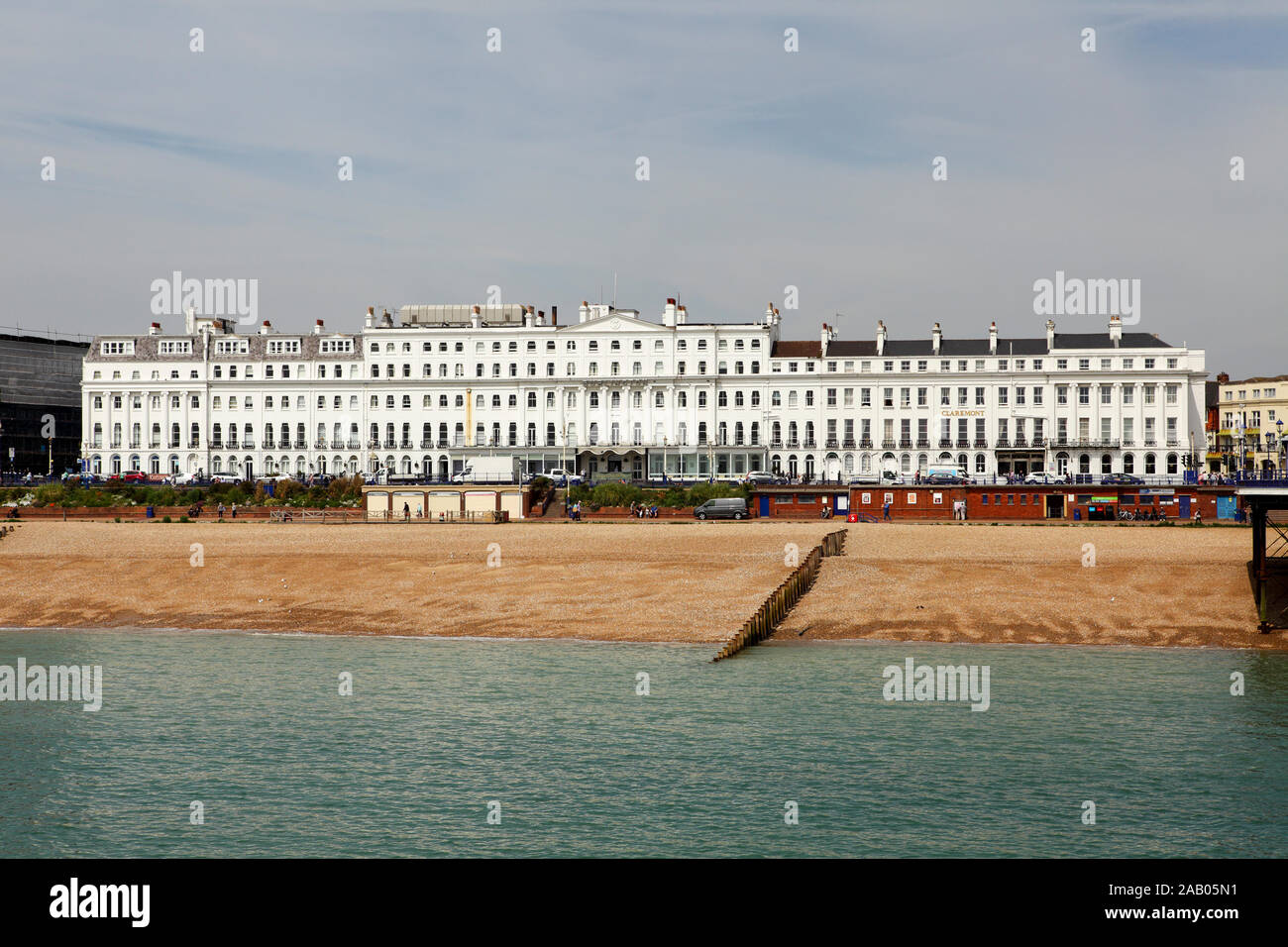 Seafront hotels and pier with multiple groins on Eastbourne beach ...