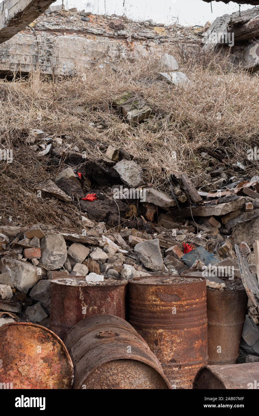 Old abandoned barrels. Fuel barrels. Old rusty barrels. Vertical frame ...