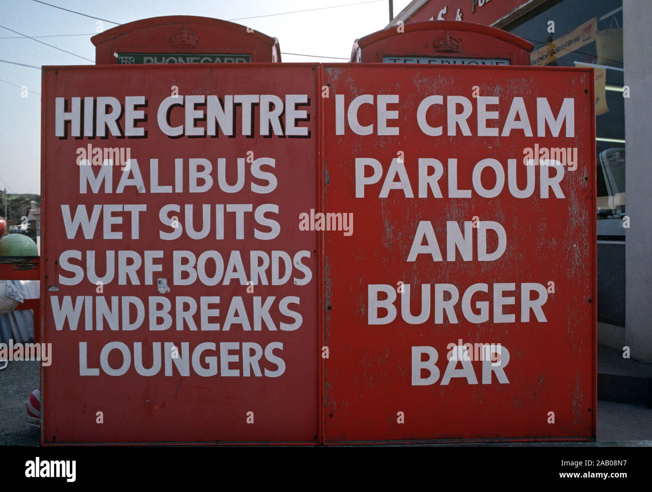 1980s beach advertising board at Polzeath, North Cornwall, England ...