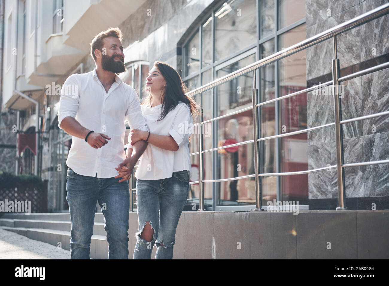 A young funny loving couple have fun on a sunny day Stock Photo - Alamy
