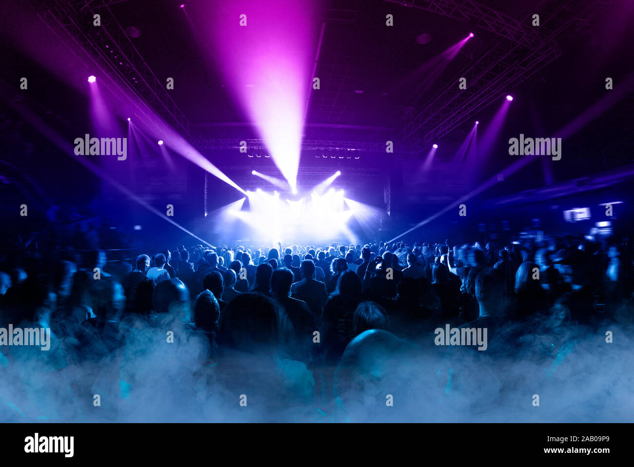 Concert crowd attending a huge gig Stock Photo - Alamy