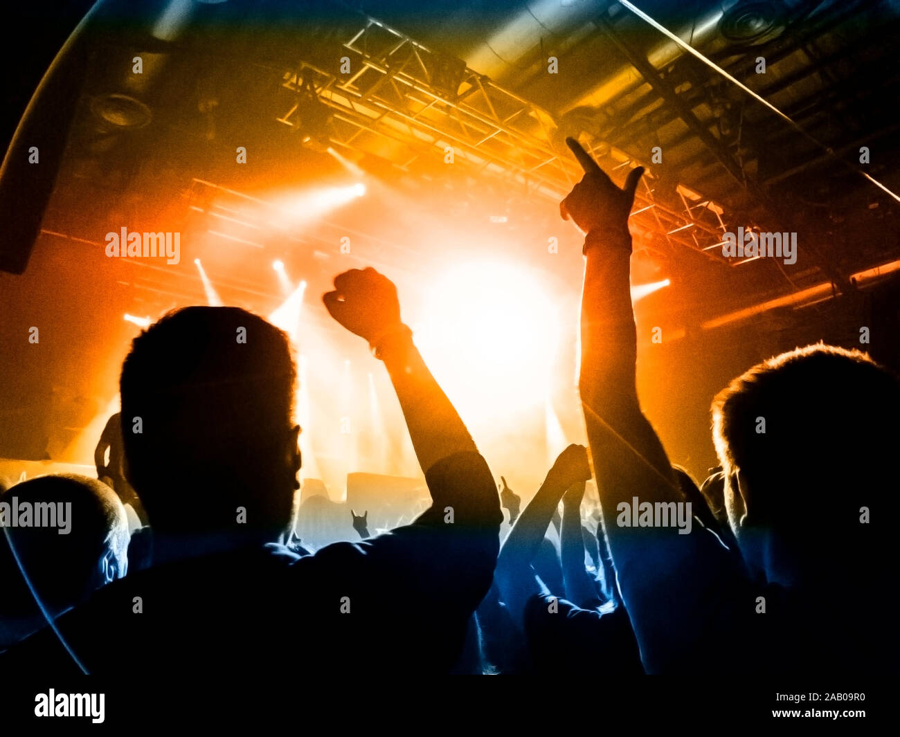 Concert crowd attending a huge gig Stock Photo - Alamy