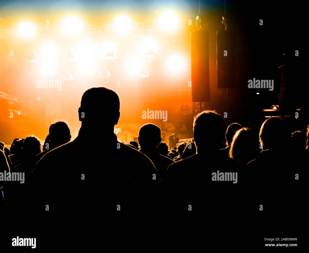 Concert crowd attending a huge gig Stock Photo - Alamy