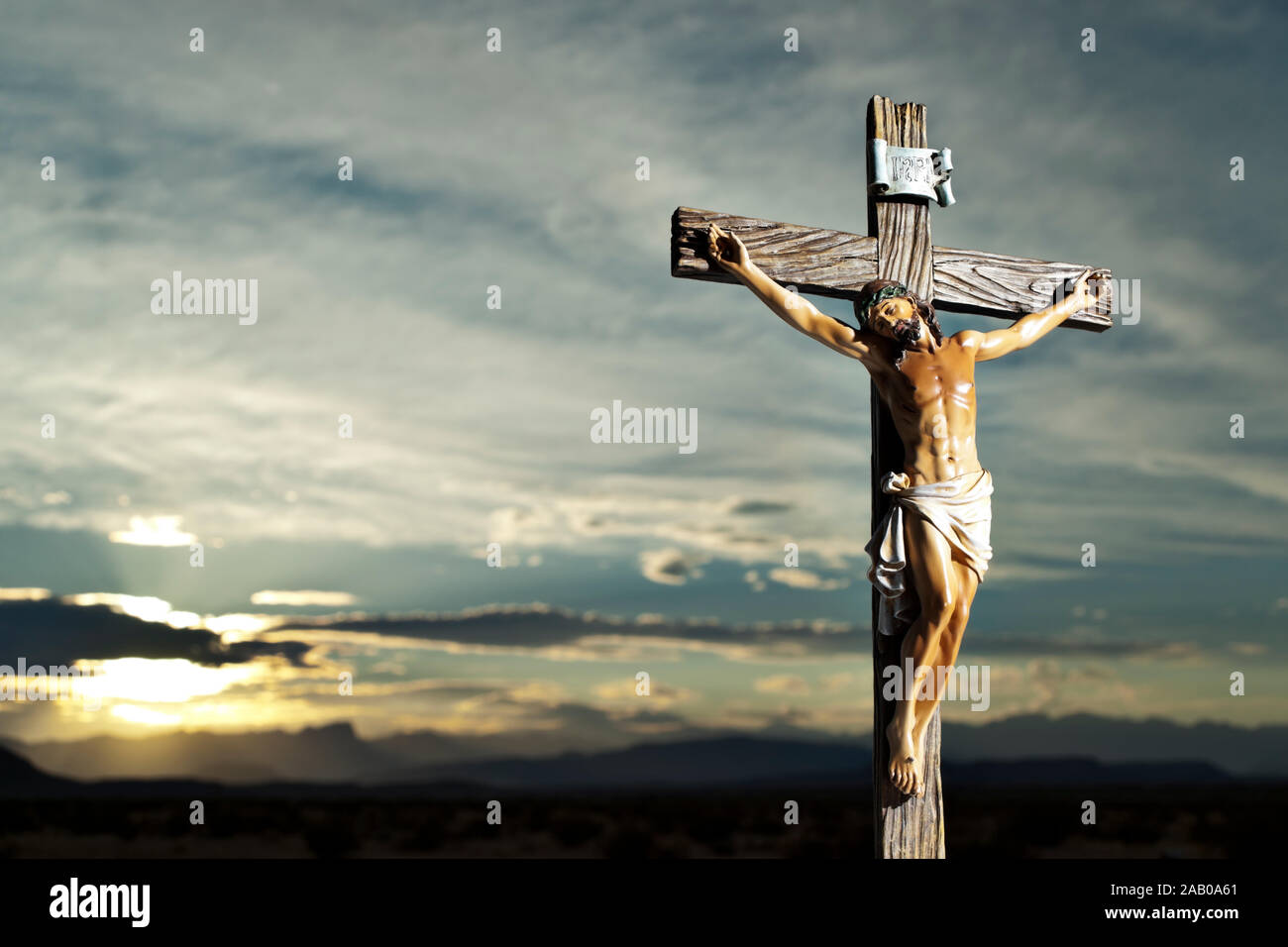 A small statue of Jesus Christ on the Cross Stock Photo - Alamy