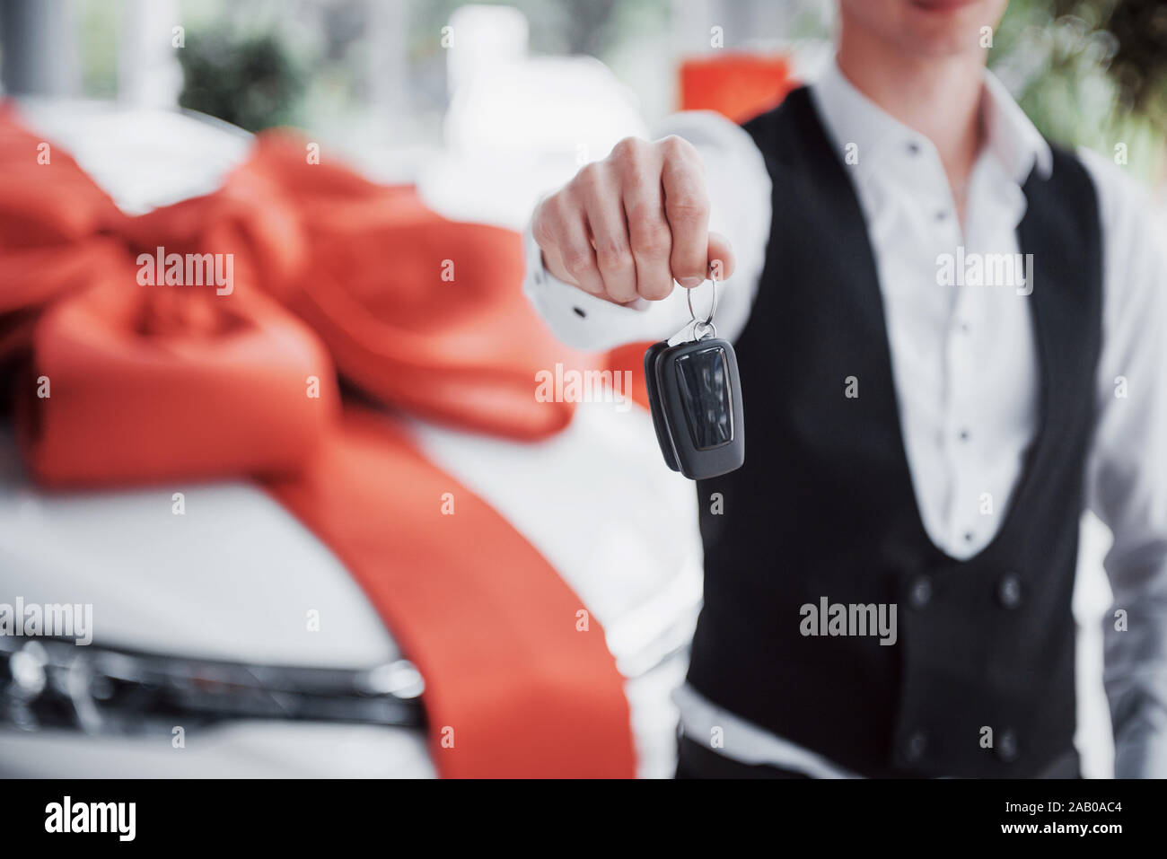 Happy young man with keys in his hands, lucky buy a car Stock Photo - Alamy