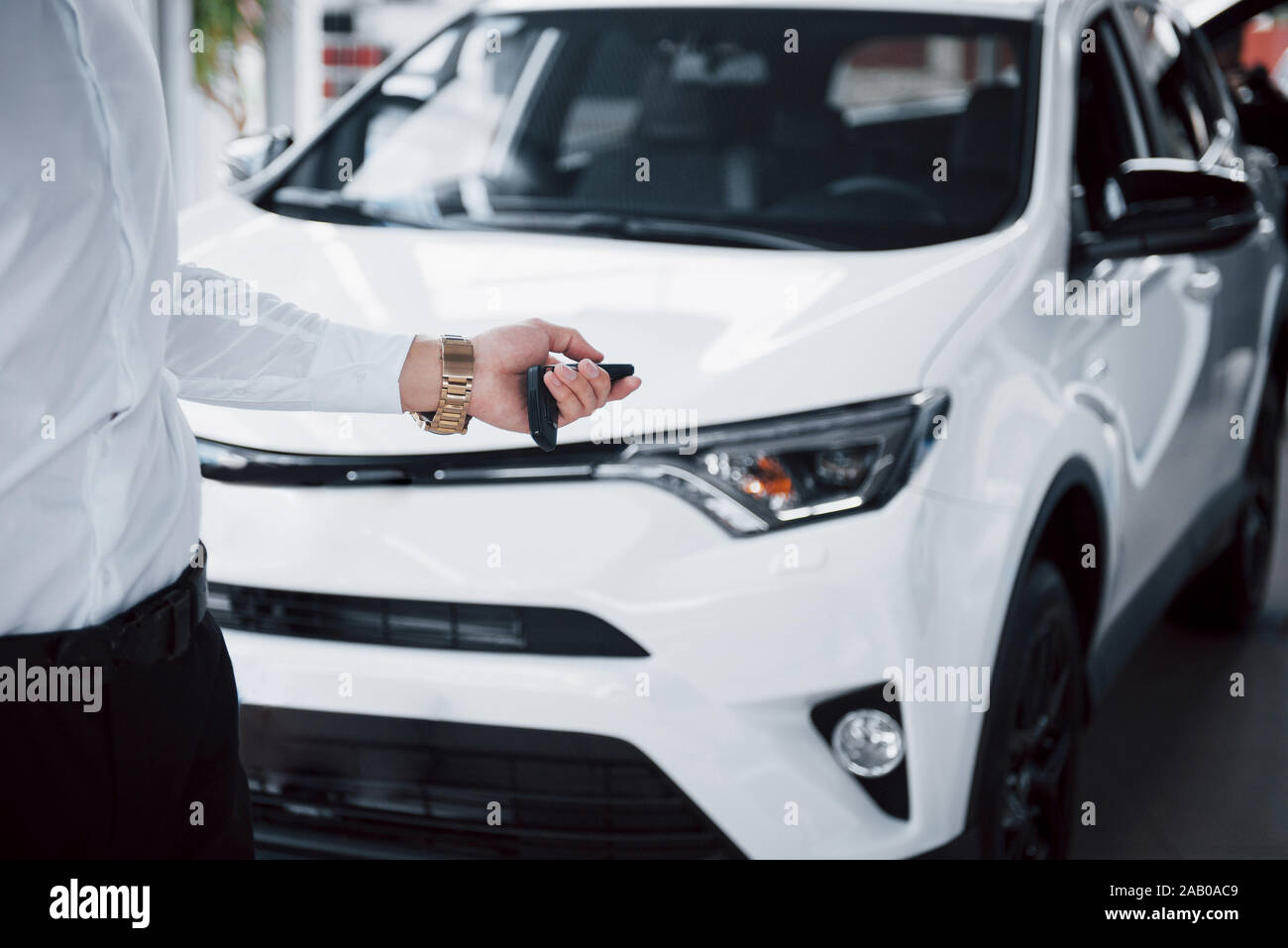 Happy young man with keys in his hands, lucky buy a car Stock Photo - Alamy