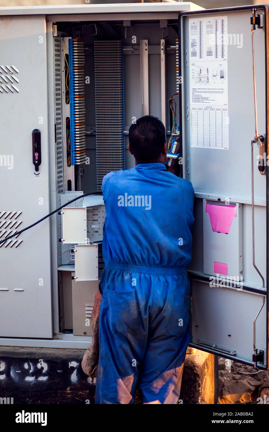 Person working on electrical box hi-res stock photography and images ...