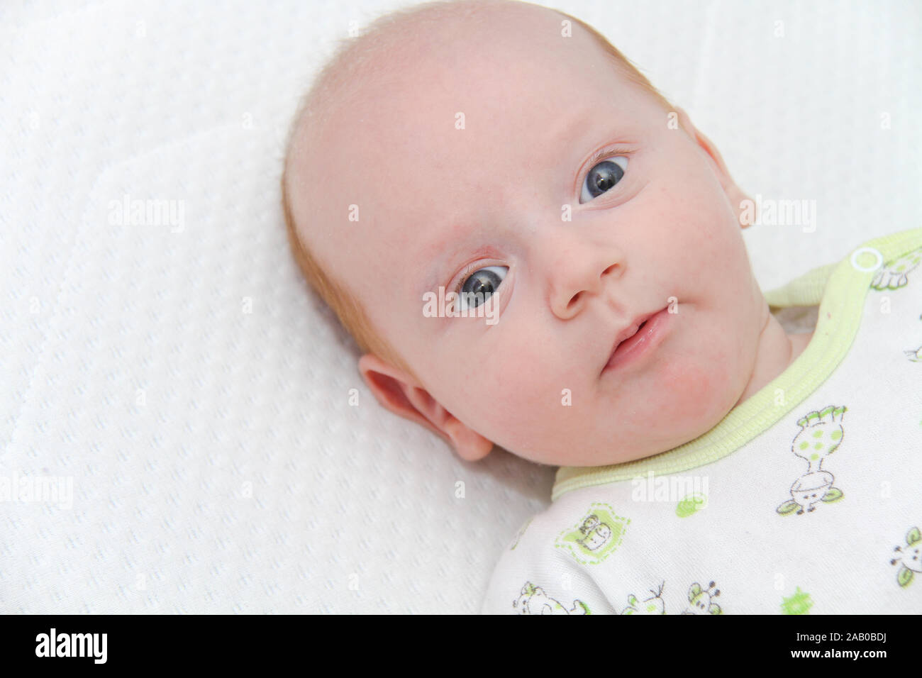 Photo of the Two months old newborn male baby enjoying Stock Photo - Alamy