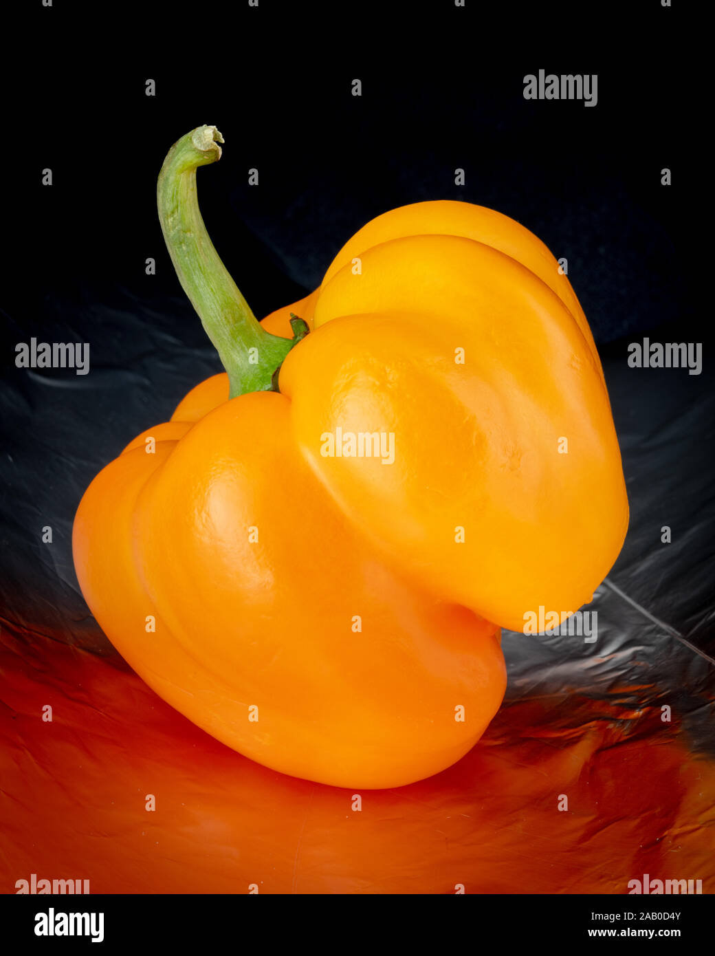 Small bell pepper close up laying on its side Stock Photo - Alamy