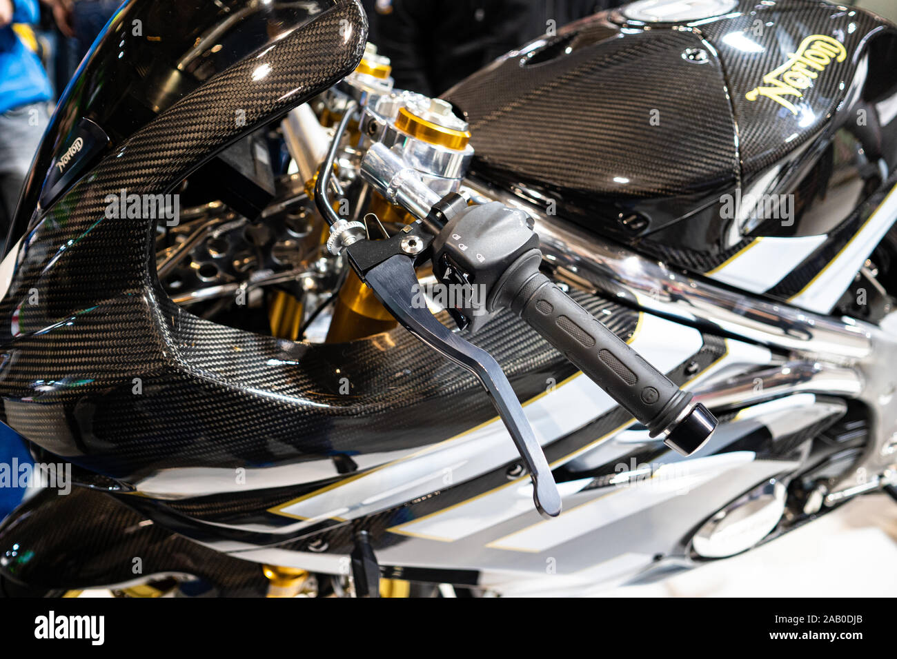 Close-up of carbon fibre motorcycle handlebar and brake lever detail ...