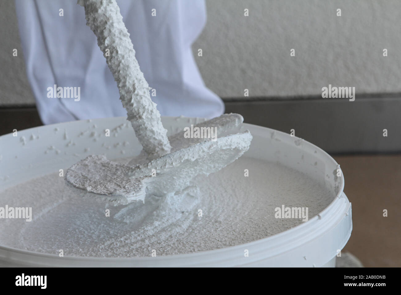 Mixing cement in a bucket hi-res stock photography and images - Alamy