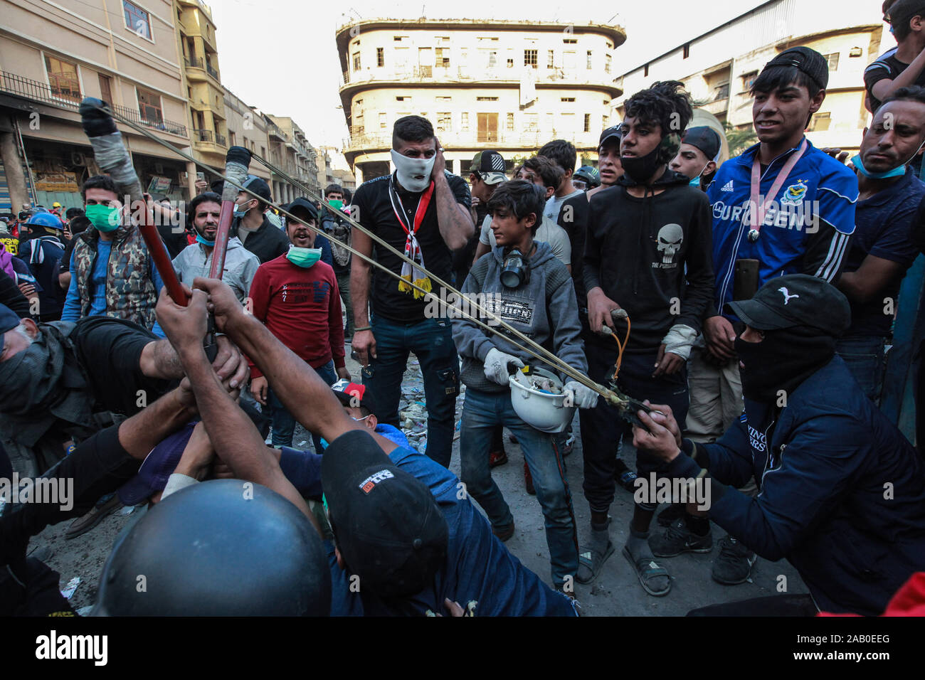 Protesters hurl rocks during hi-res stock photography and images - Alamy