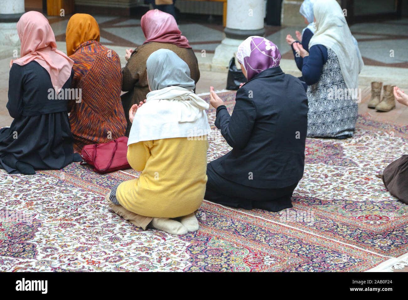 Photo of the Prayer performing by muslim women Stock Photo - Alamy