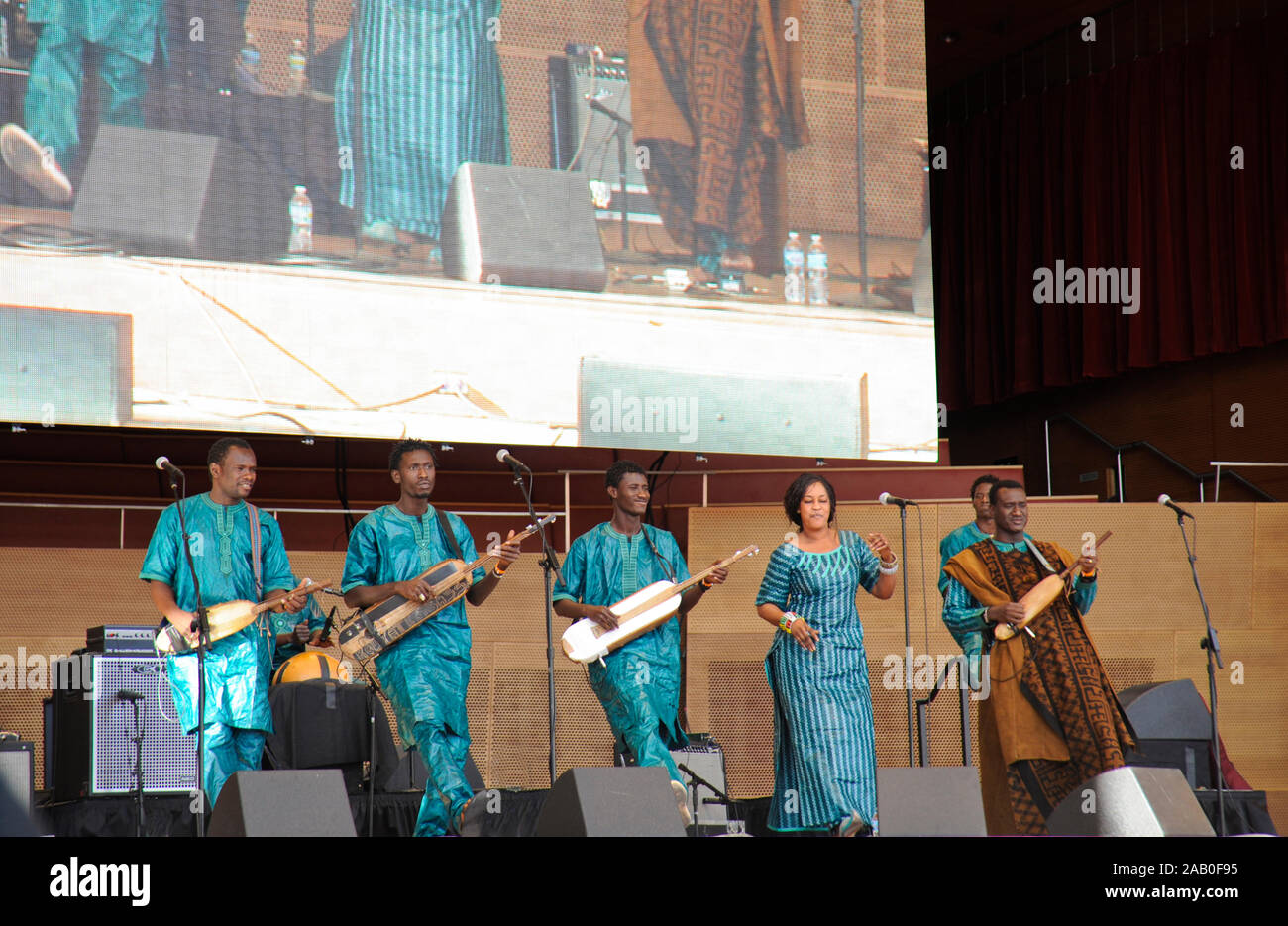 Bassekou Kouyaté and his band, Ngoni Ba, from Mali. The female singer ...