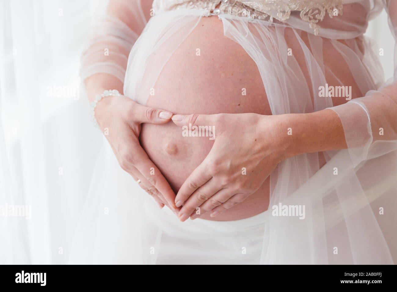Baby belly outdoors hi-res stock photography and images - Alamy