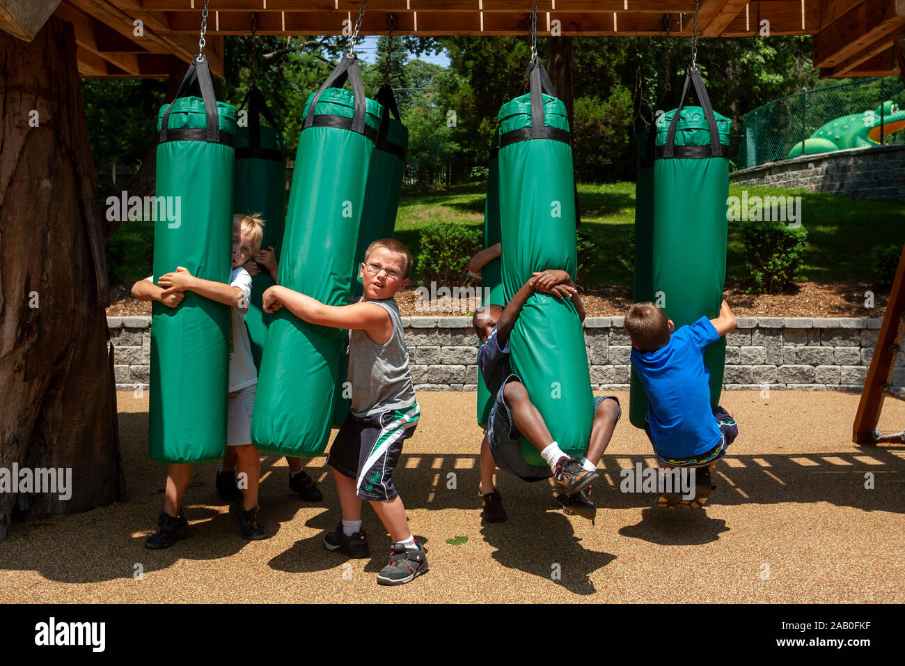 Boys in playground at day camp Stock Photo - Alamy