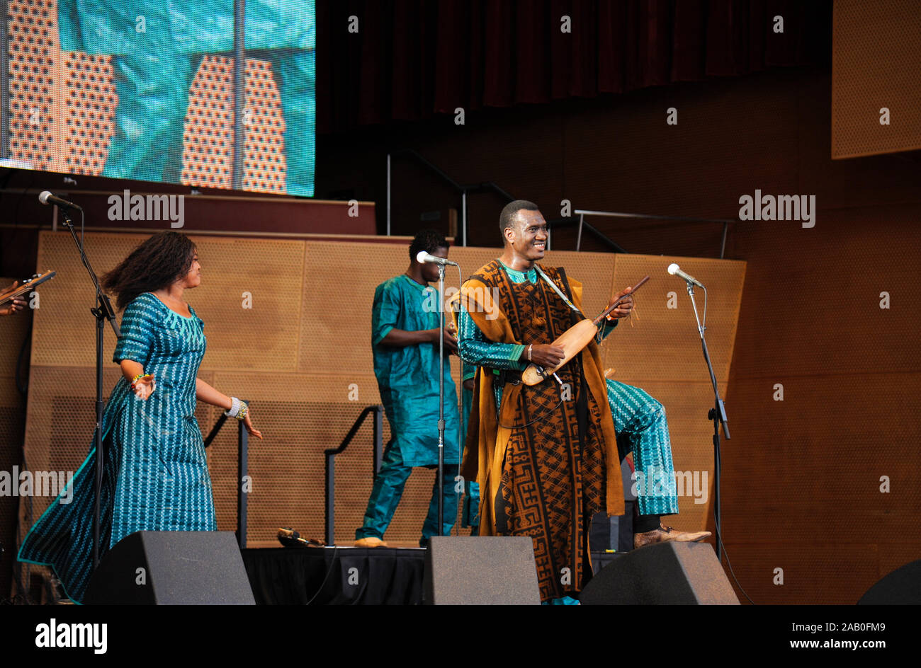 Bassekou Kouyaté and his band, Ngoni Ba, from Mali. The female singer ...