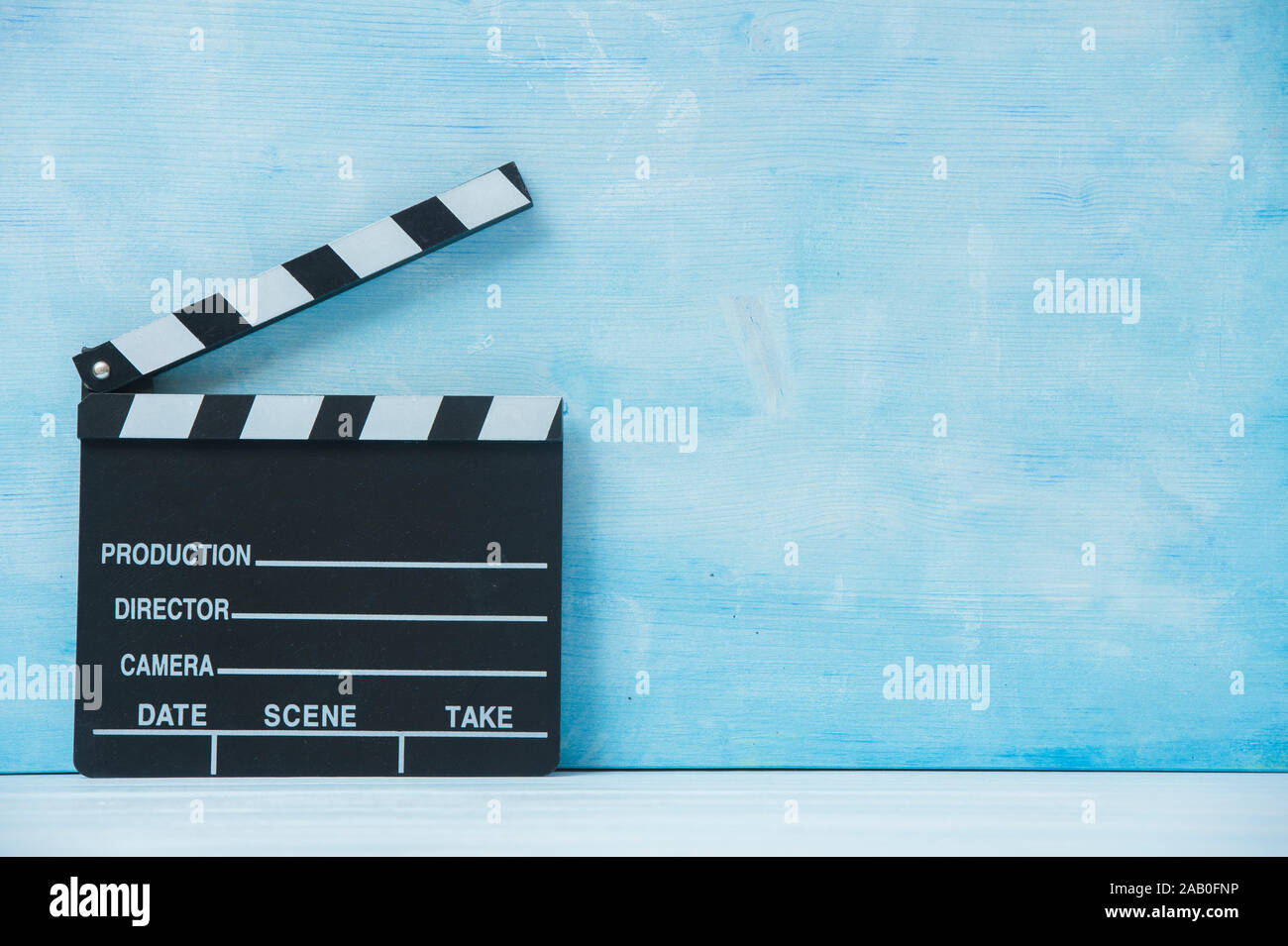 Movie clapper on blue background, cinema concept Stock Photo - Alamy