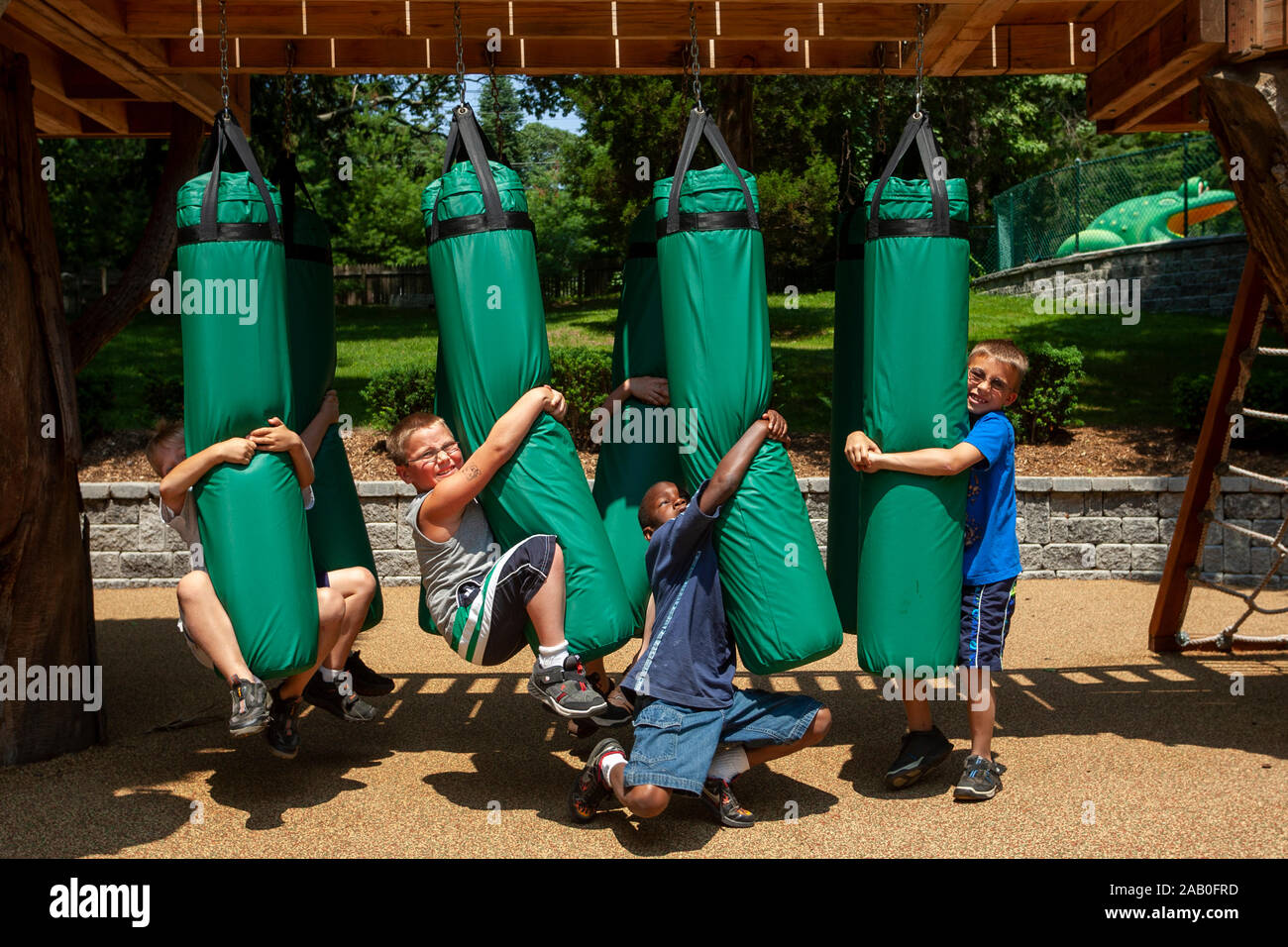 Boys in playground at day camp Stock Photo - Alamy