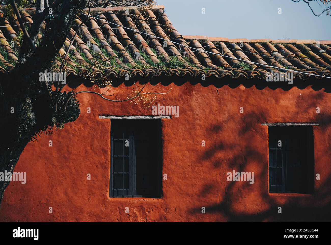 Old colonial house with red tiles Stock Photo - Alamy