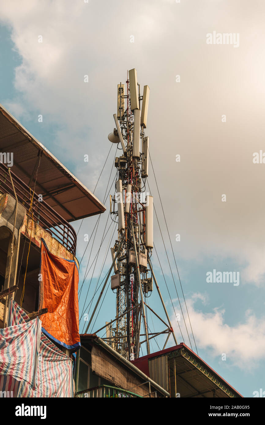Communication Antenna Mast stucture built on top of building in Vietnam ...
