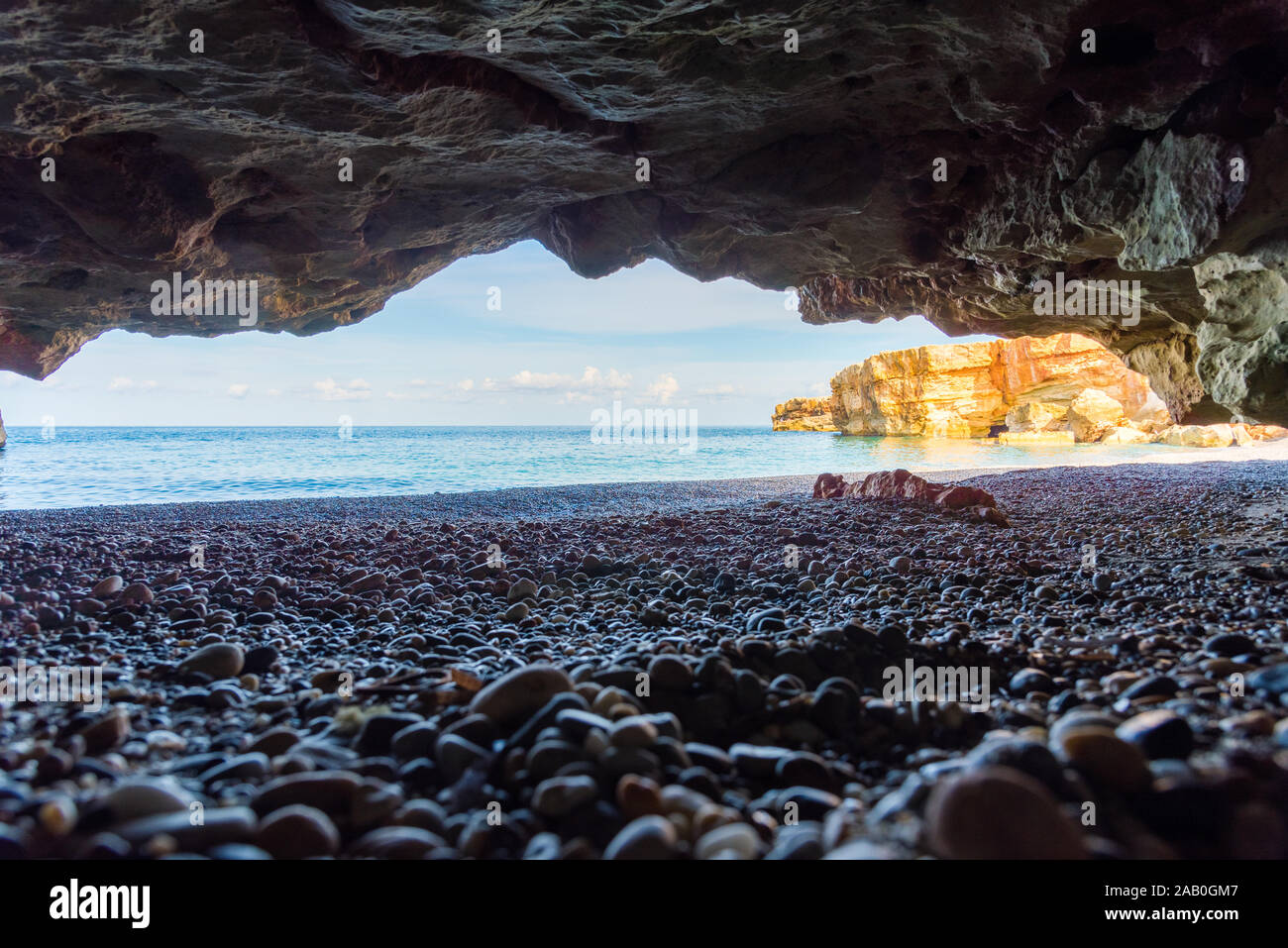 Beach of Spilies or Kitrenosi with sea caves near Rethimno, Crete ...