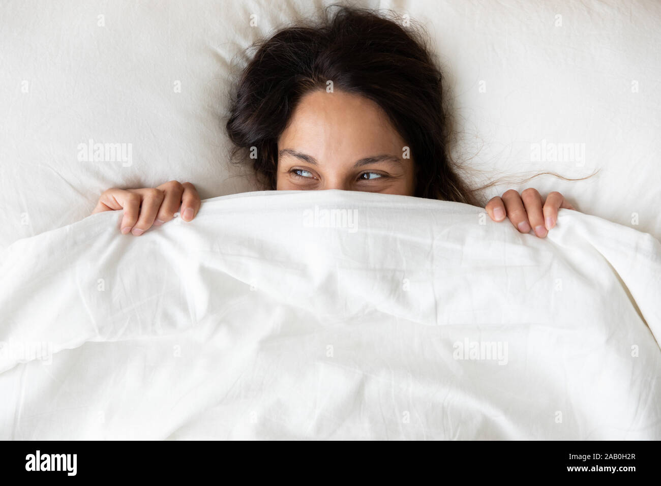 Bed hiding duvet hi-res stock photography and images - Alamy