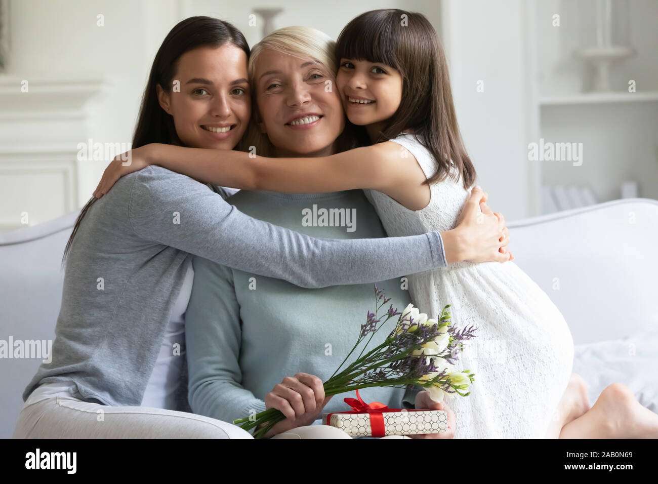 Three female generations celebrating International Womens Day looking ...