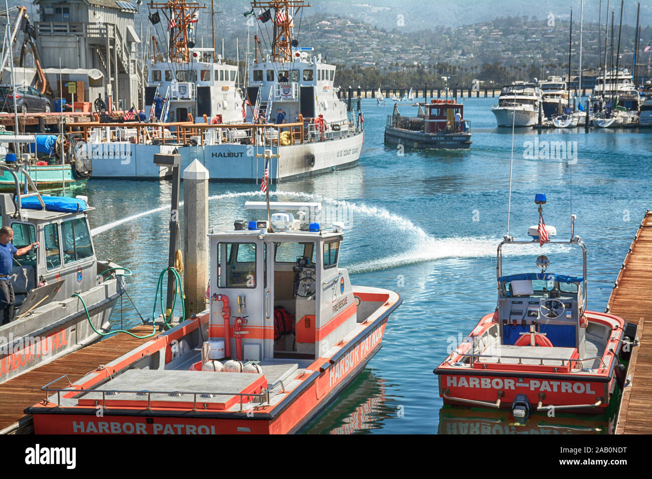 Two Harbor Patrol boats docked along with US Coast Guard ships, yachts ...