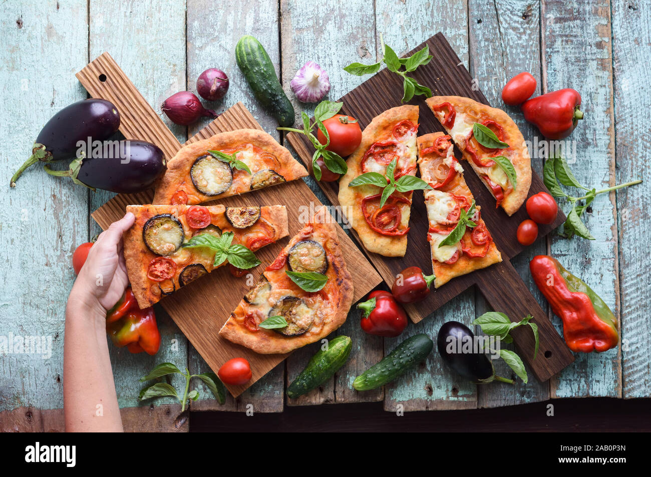 Healthy vegetarian food. Pizzas with eggplants, tomatoes and bell ...