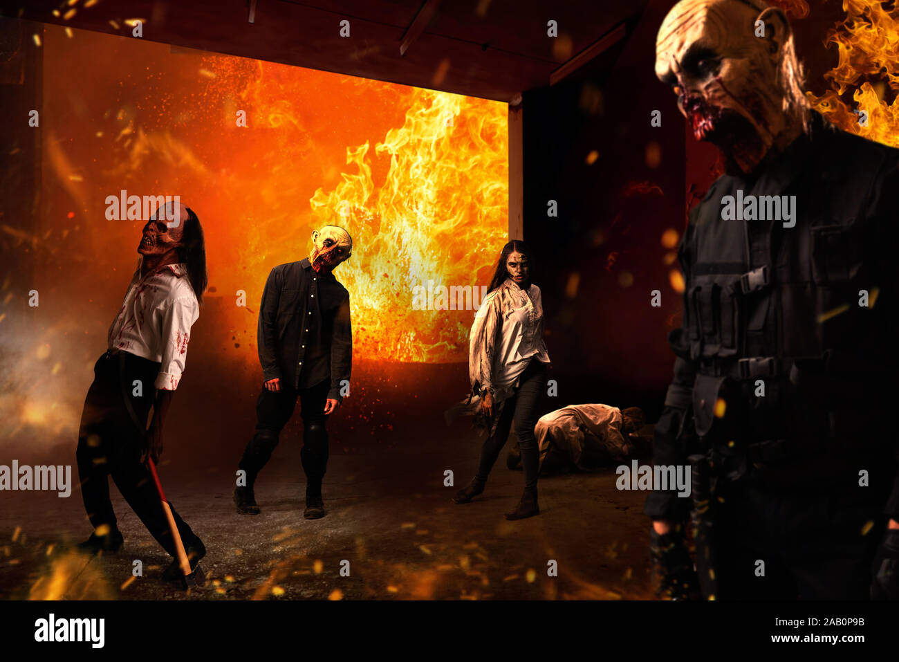 Zombies in a burning movie theater, monsters Stock Photo - Alamy