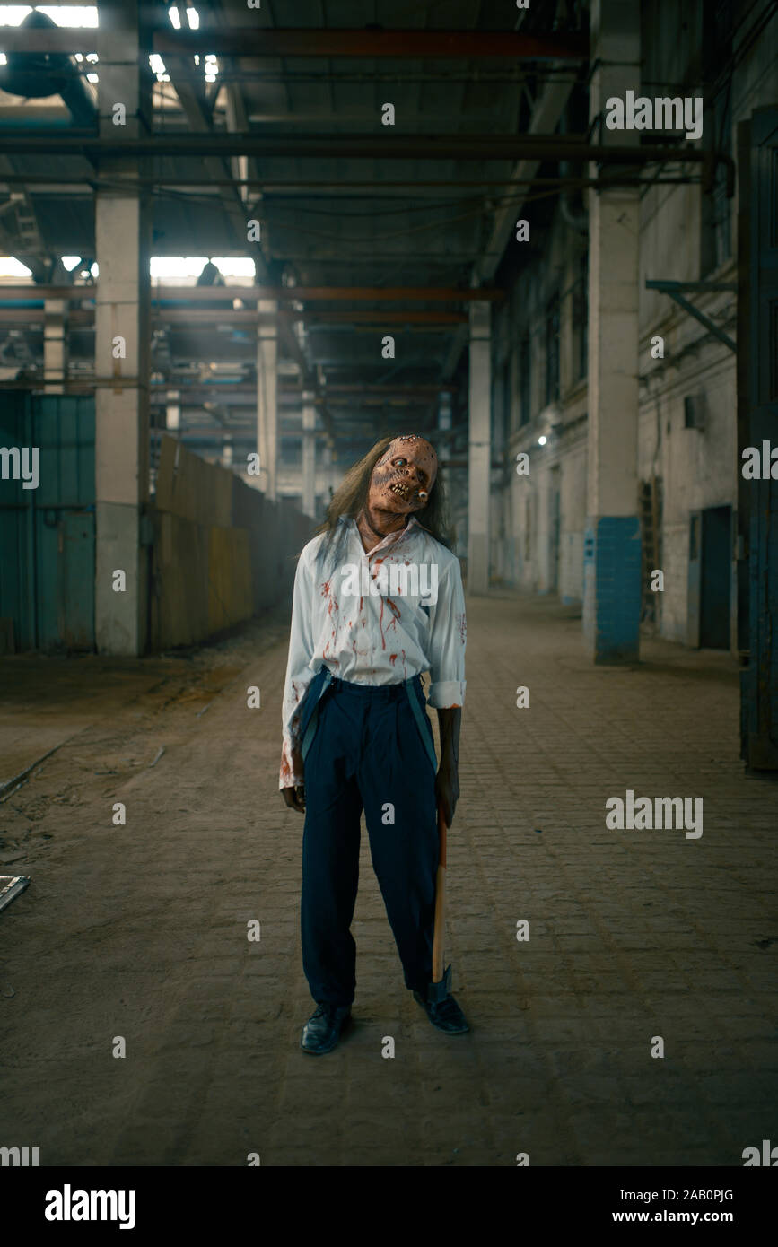 Zombie man, undead human in abandoned factory Stock Photo - Alamy