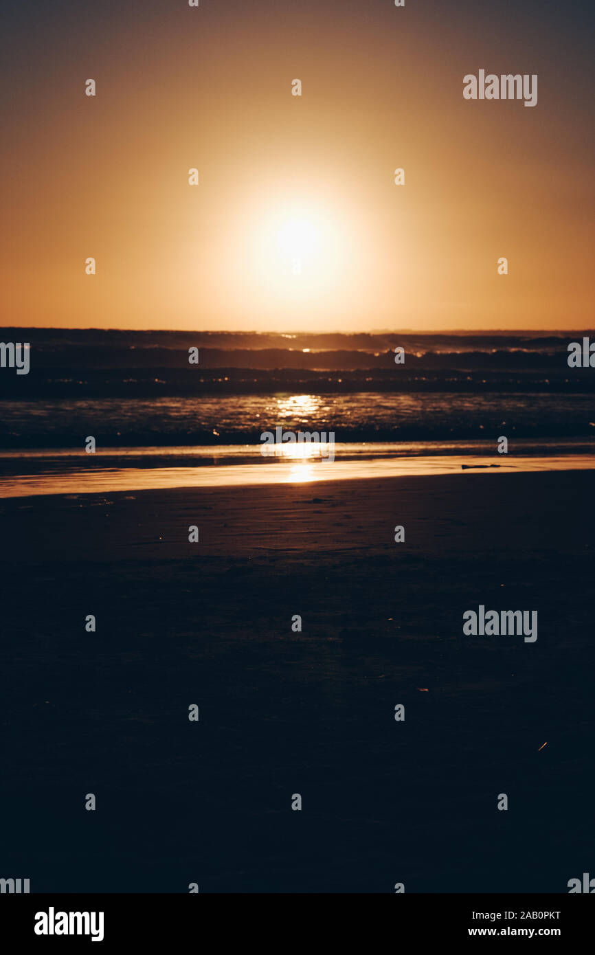 Dark sunset at the beach in Uruguay Stock Photo - Alamy