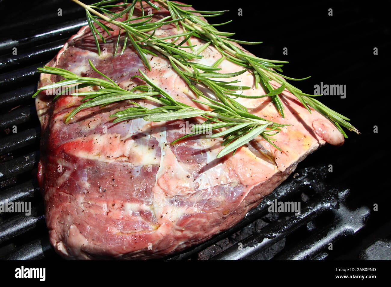 Steak of beef with rosemary cook on the grill Stock Photo - Alamy