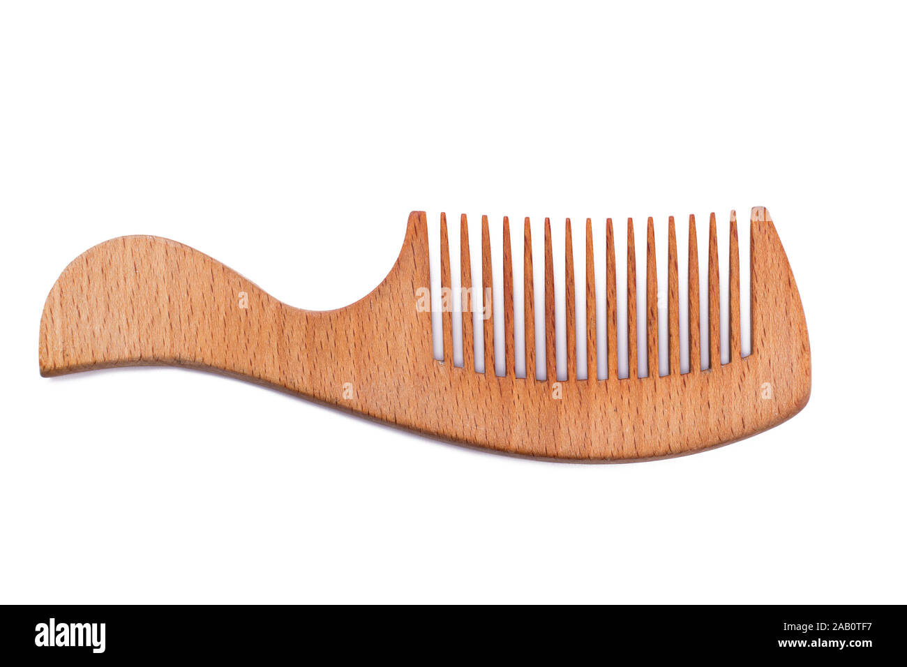 Wooden hair comb on white background Stock Photo - Alamy