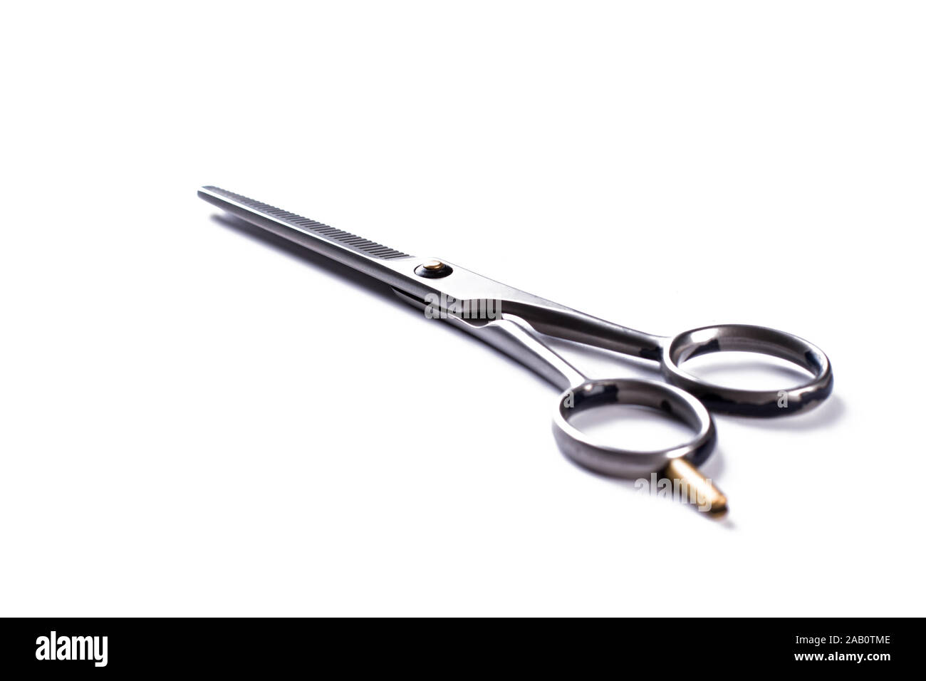 Barbers scissors on white background Stock Photo - Alamy