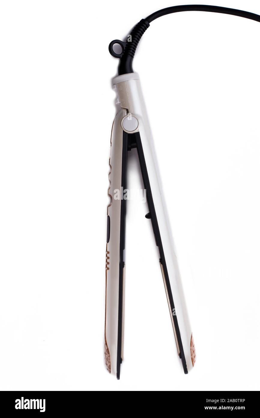 Ceramic hair straightener Stock Photo - Alamy