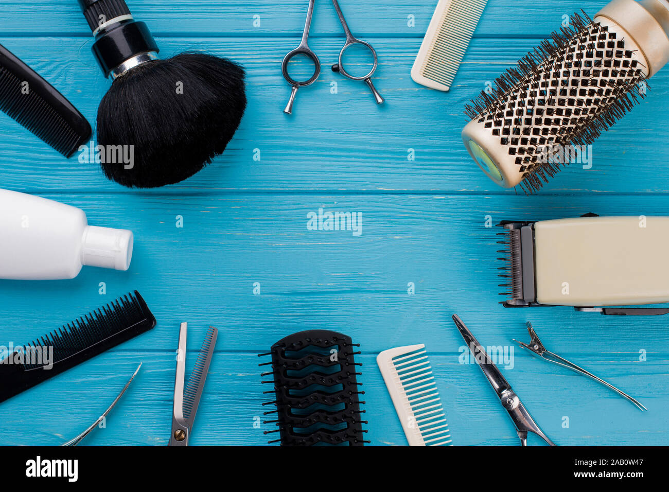 Professional hairdresser tools on blue background Stock Photo - Alamy