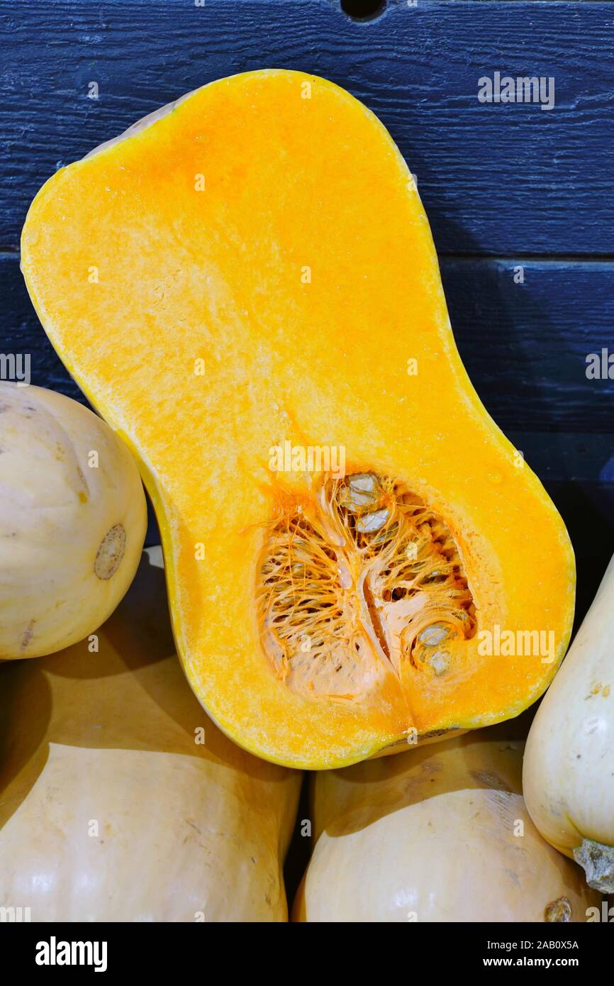 Cut orange slice of butternut squash Stock Photo - Alamy