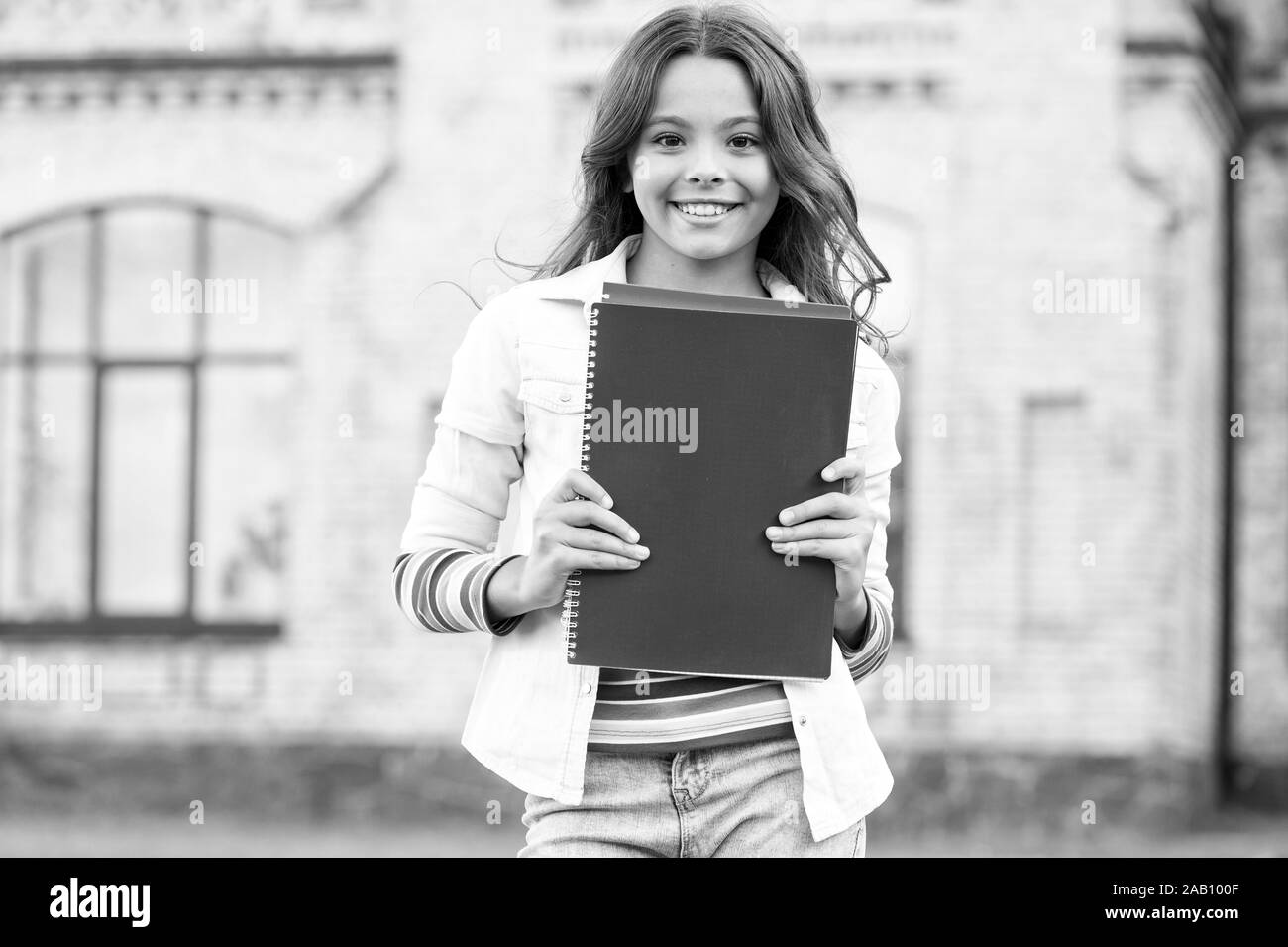 Read more books. Happy small child going to library to take books ...