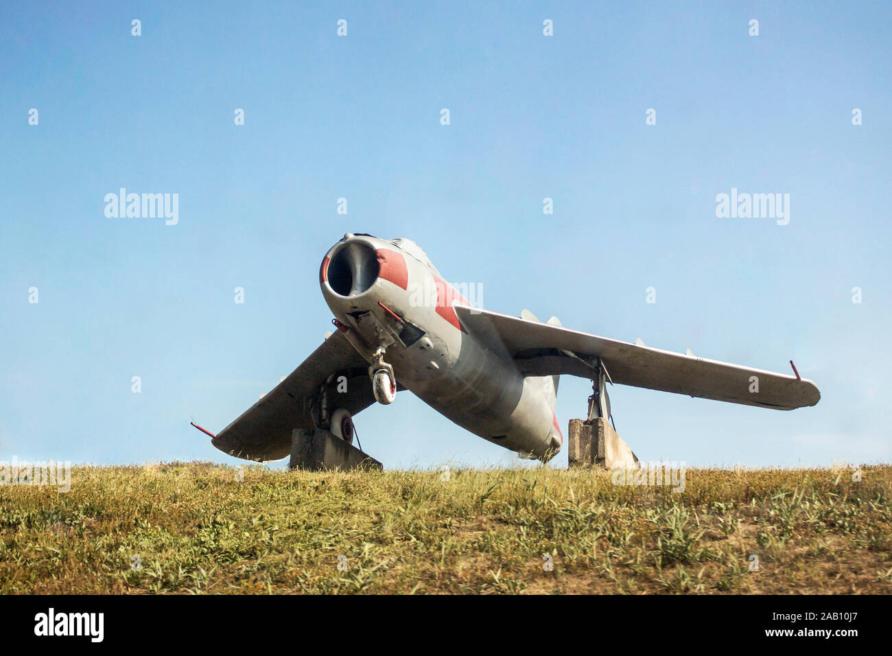 The exterminator of the second world war stands on earth. Vintage plane ...