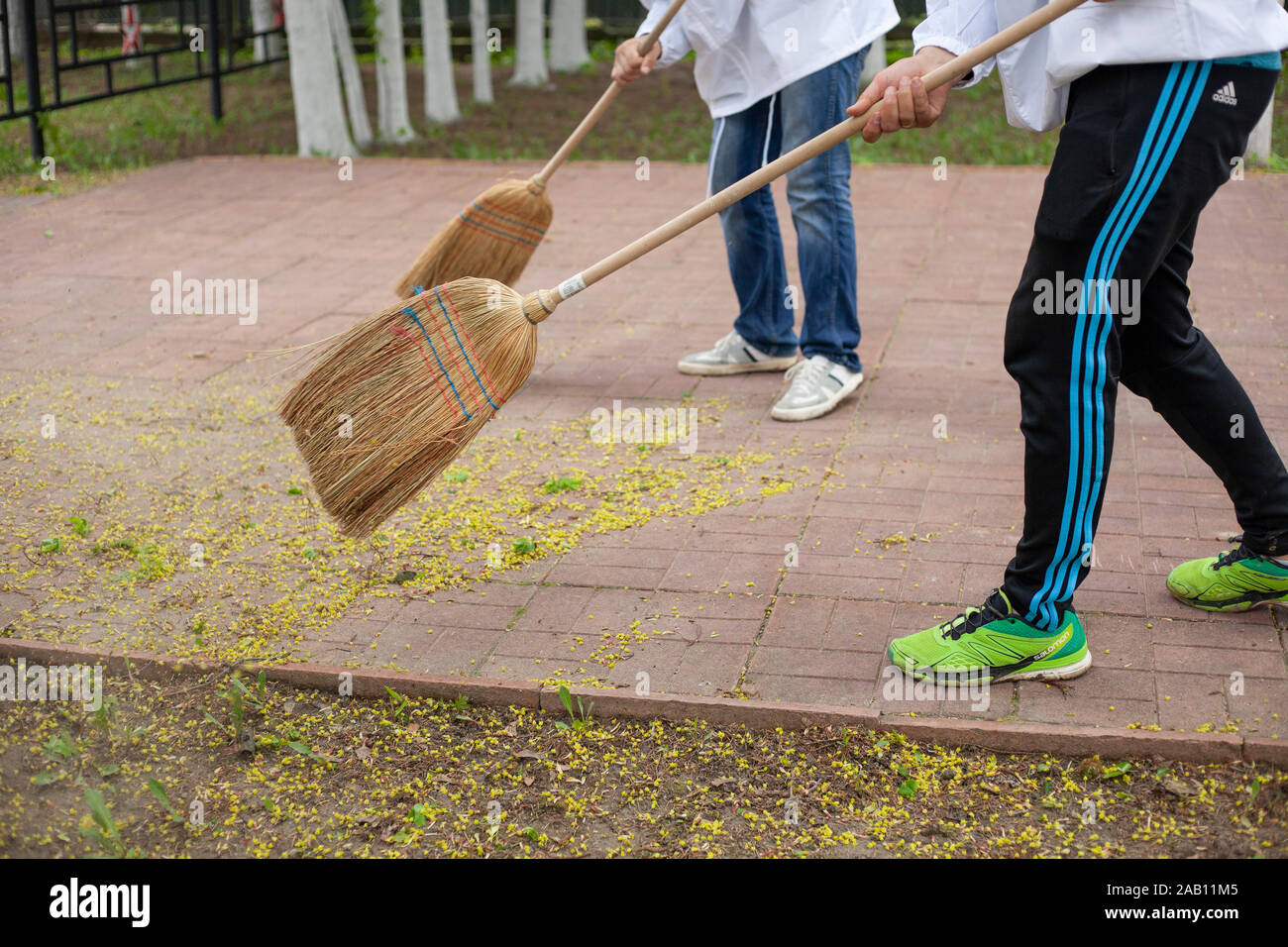 Cleaning an area with a broom hi-res stock photography and images - Alamy