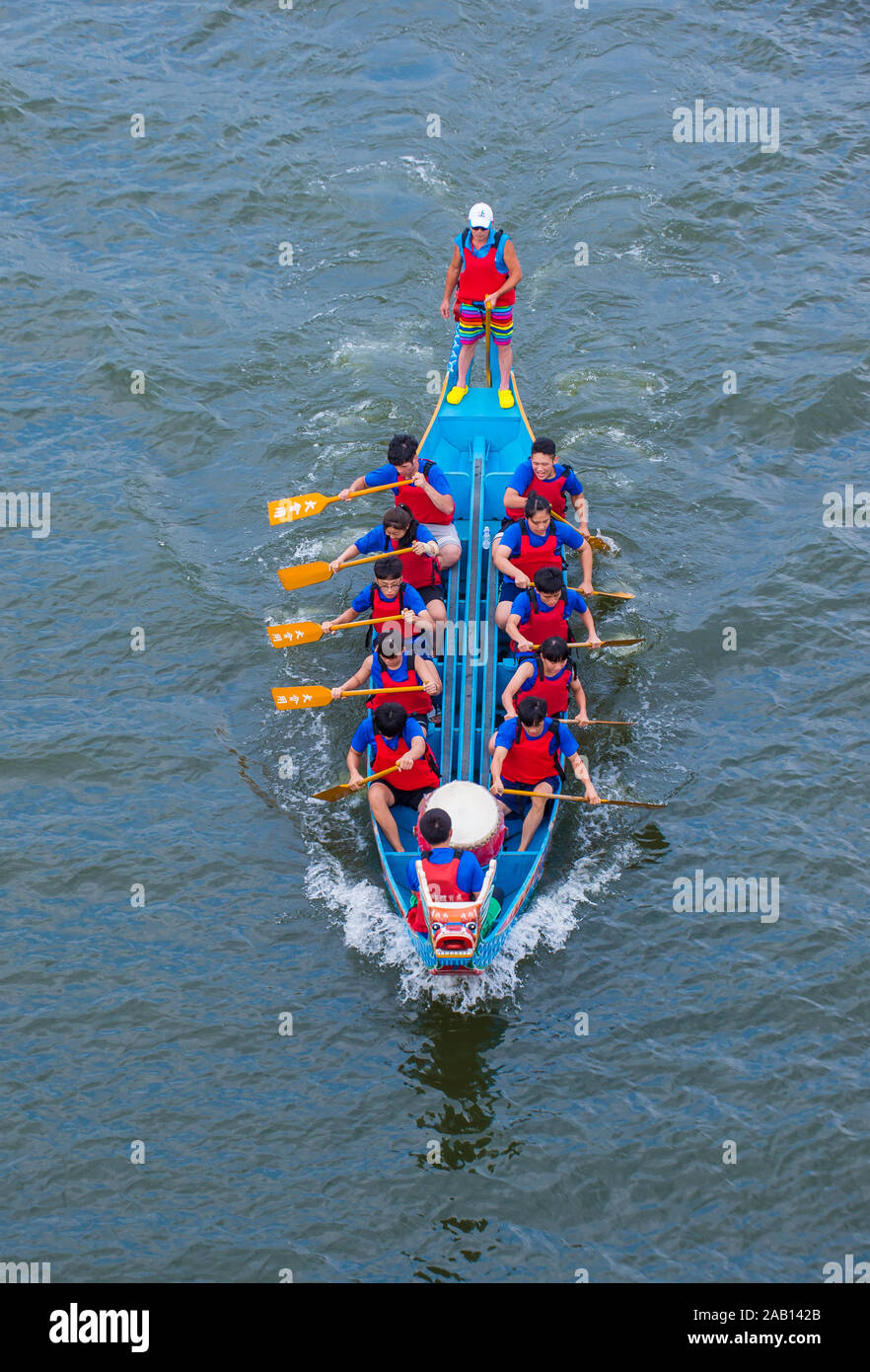 Dragonboat team racing during the 2019 Taipei Dragon Boat festival in ...
