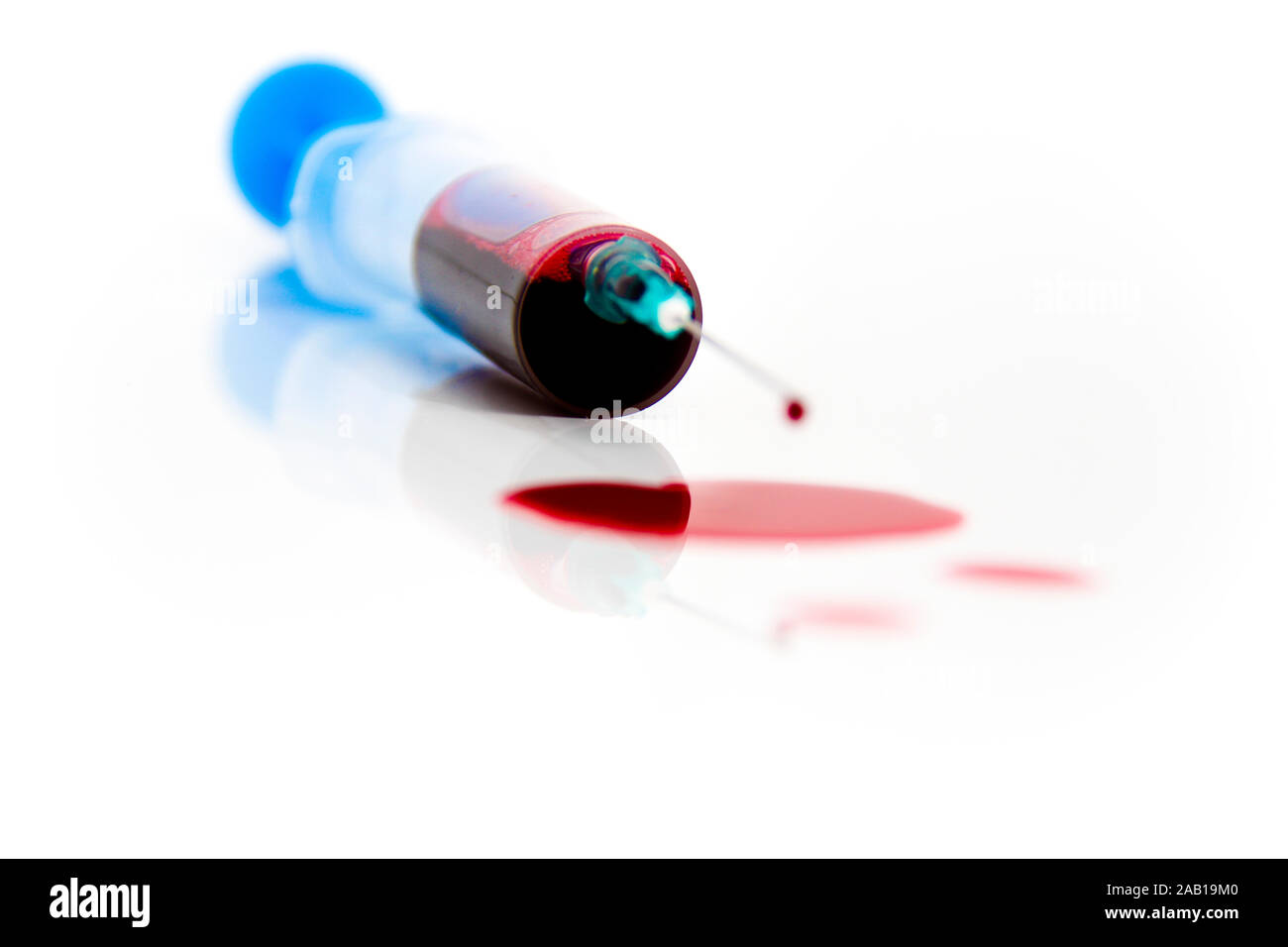 Photo of the Syringe in laboratory environment, blood and medical ...