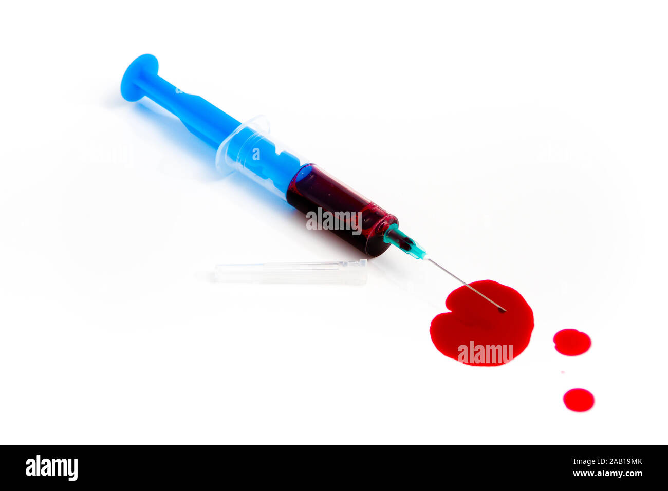 Photo of the Syringe in laboratory environment, blood and medical ...